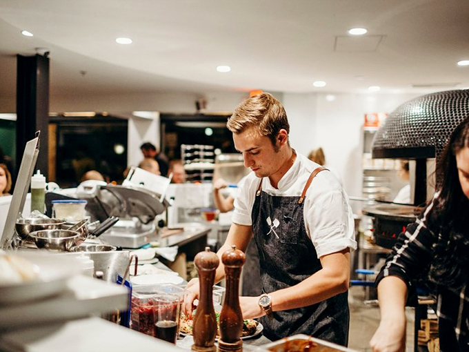 Behind every great pizza is a focused chef, treating dough with the reverence usually reserved for fine art or newborn babies.