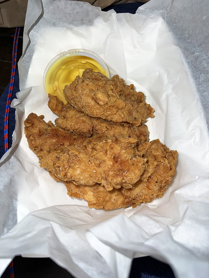 Chicken tenders that actually live up to their name &ndash; genuinely tender, with a golden crust that shatters just right. The honey mustard sauce is liquid gold.