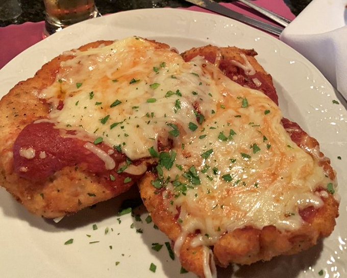 Chicken parmigiana that's achieved the perfect balance of crispy exterior and tender interior &ndash; the culinary equivalent of finding the perfect pair of jeans.