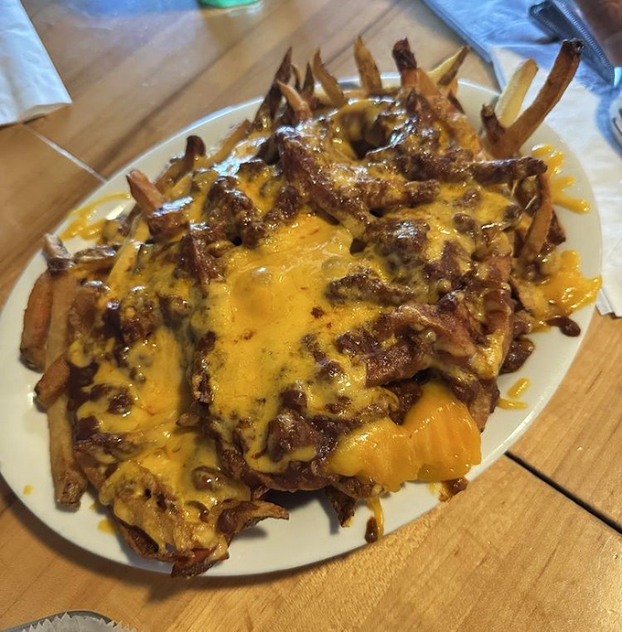 Chili cheese fries that don't mess around. That molten cheese blanket isn't just for show&mdash;it's insulating a treasure trove of perfectly crispy potatoes below.