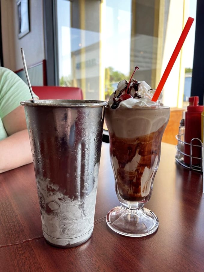 Chocolate malt meets sundae in a glass tango of indulgence. The metal mixing cup alongside means this relationship comes with a bonus round.