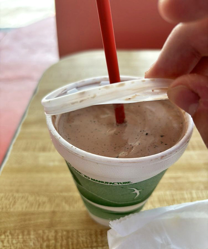 That's not just a chocolate shake &ndash; it's a time machine in a cup, thick enough to require serious straw commitment and patience.