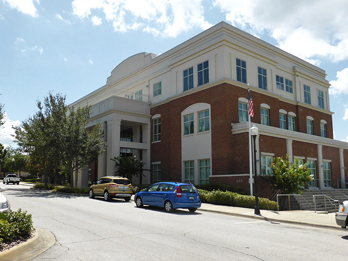 Clermont's City Hall combines brick and cream with architectural flourishes that say, "Yes, we take ourselves seriously, but we also enjoy a good farmers market."