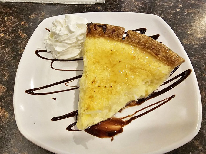 Coconut custard pie with chocolate drizzle &ndash; proof that sometimes the simplest desserts are the ones that make you close your eyes and sigh with contentment.