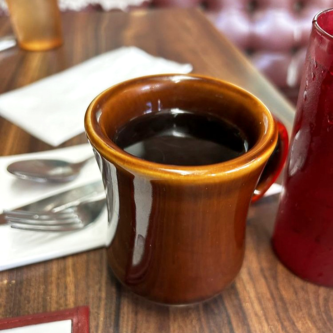 Coffee served in those brown diner mugs that somehow make everything taste better—like drinking from the Holy Grail of caffeine.