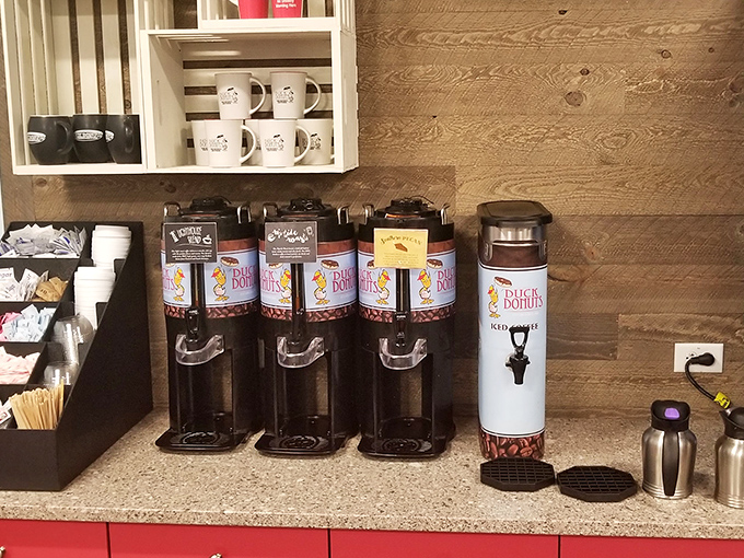 Coffee station locked and loaded for the morning rush. Those dispensers stand at attention like caffeinated soldiers ready for duty.