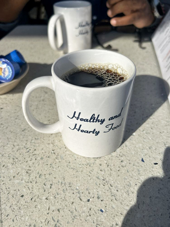 "Healthy and Hearty Food" proclaims the mug, and the rich, dark coffee inside backs up that promise with every sip.