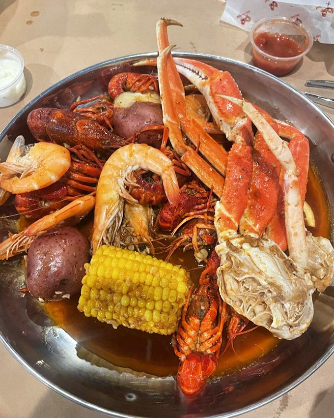 Snow crab legs reaching skyward like they're trying to escape their delicious fate. Resistance is futile when butter is involved.