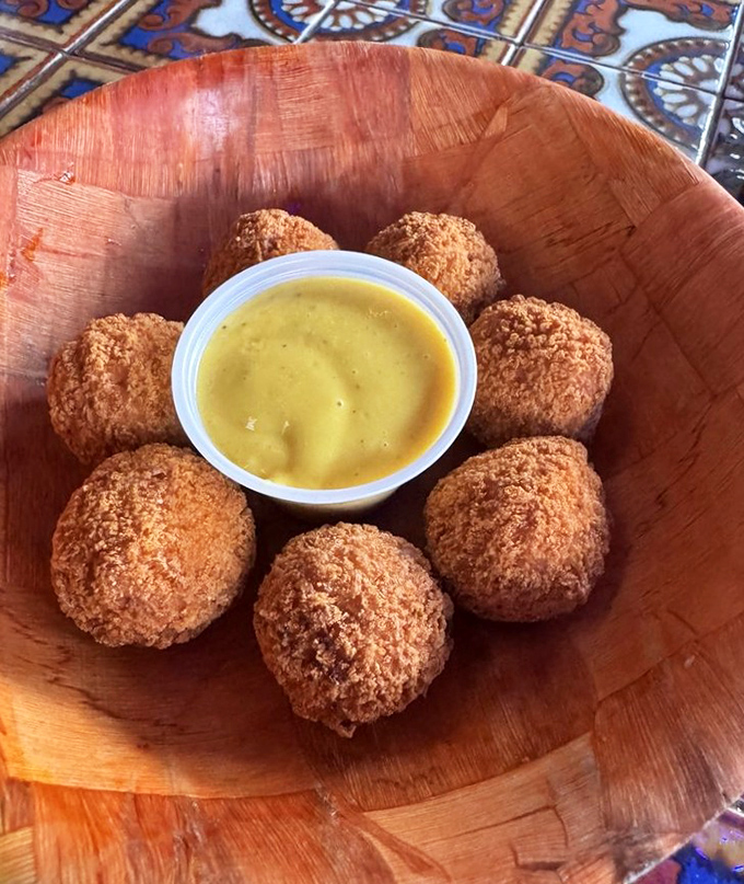 Cordon bleu balls served in rustic wooden bowls, because presentation matters even for comfort food.