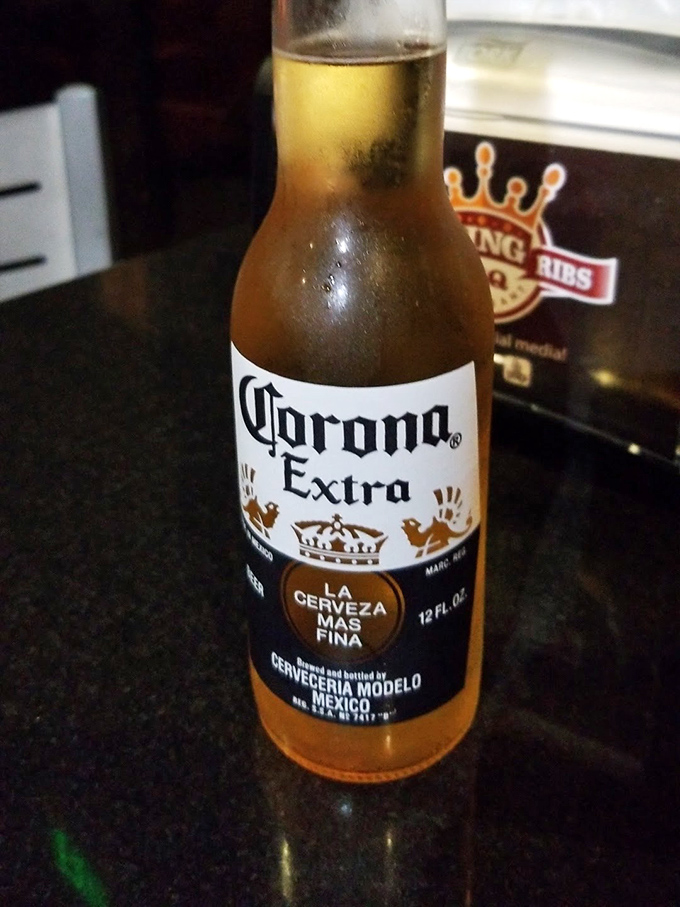 The universal barbecue truth: nothing pairs better with smoked meat than an ice-cold cerveza.