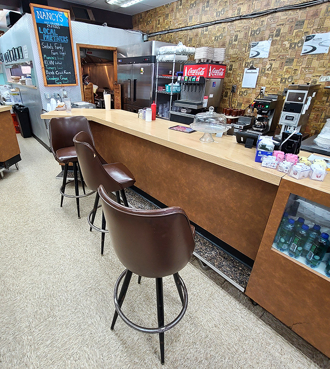 Behind this counter, breakfast dreams come true with the precision of a well-oiled diner machine.