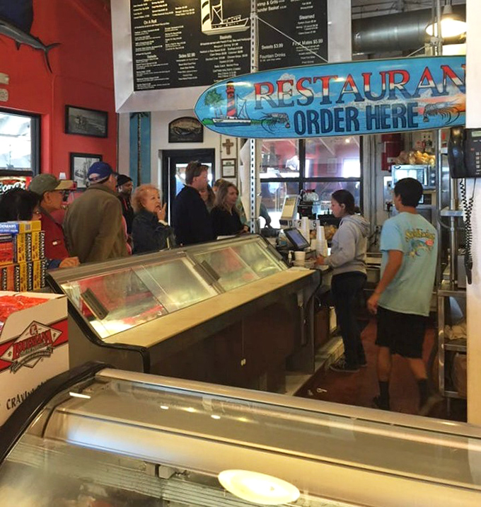 The ordering counter where dreams of fried fish become delicious reality &ndash; no fancy reservations needed.