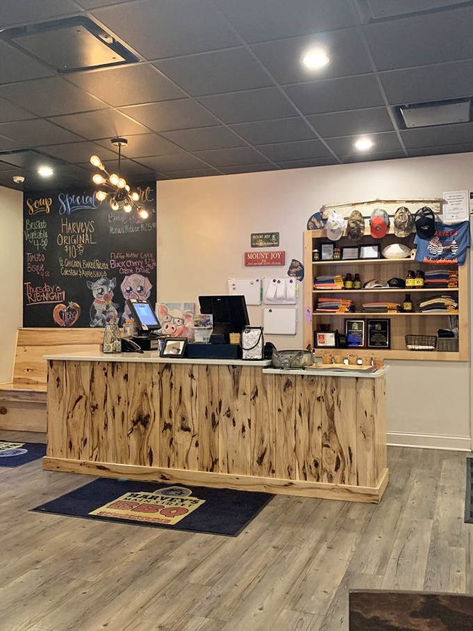 That live-edge wooden counter isn't just beautiful&mdash;it's a stage where BBQ dreams come true, with a chalkboard of specials playing supporting role.