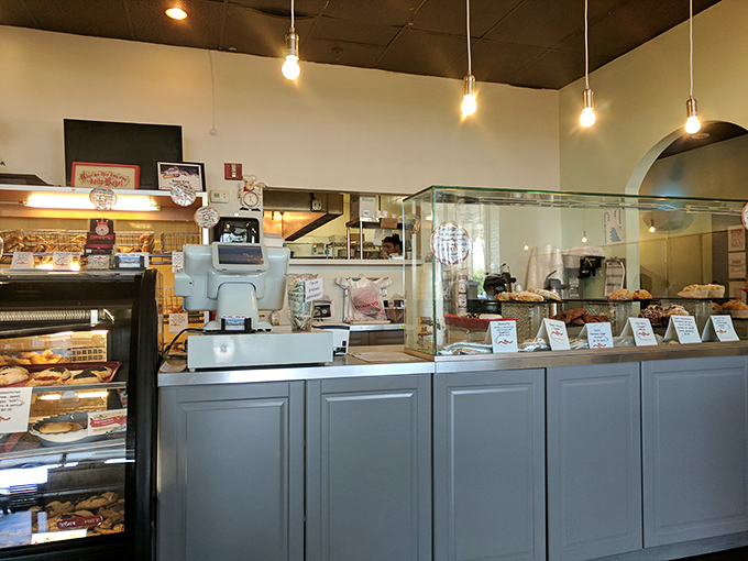 Behind this counter, breakfast magic happens with the efficiency of a Broadway production and twice the flavor.