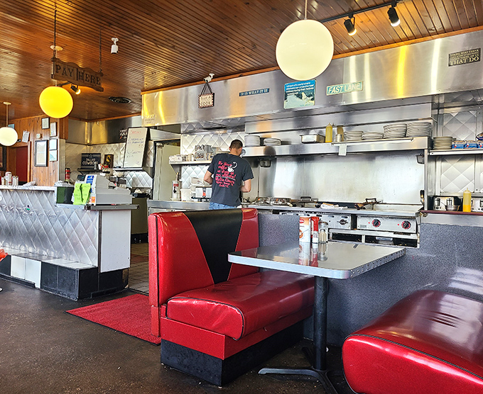 The counter seats&mdash;where solo diners find community and everyone gets a front-row view of short-order ballet in motion.
