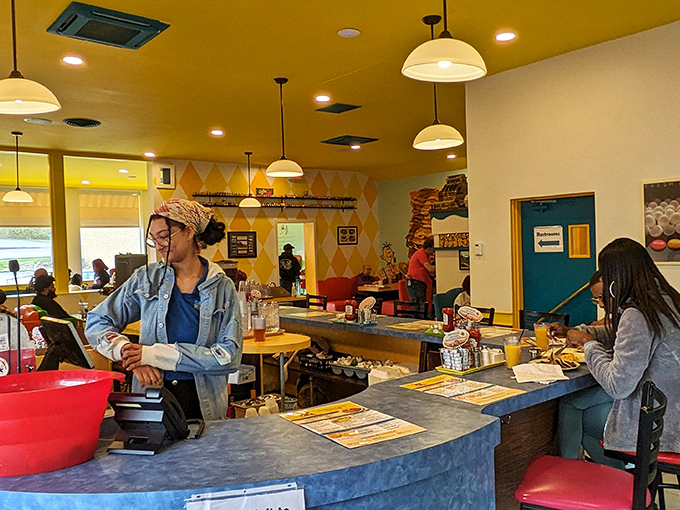 The counter seating offers front-row tickets to the breakfast theater happening behind the scenes.