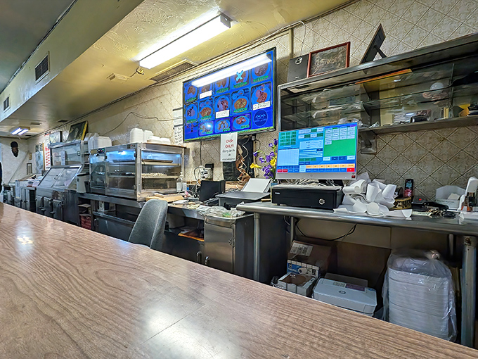 Behind this unassuming counter, culinary magic happens&mdash;where humble ingredients transform into dishes that inspire food pilgrimages across Pittsburgh.
