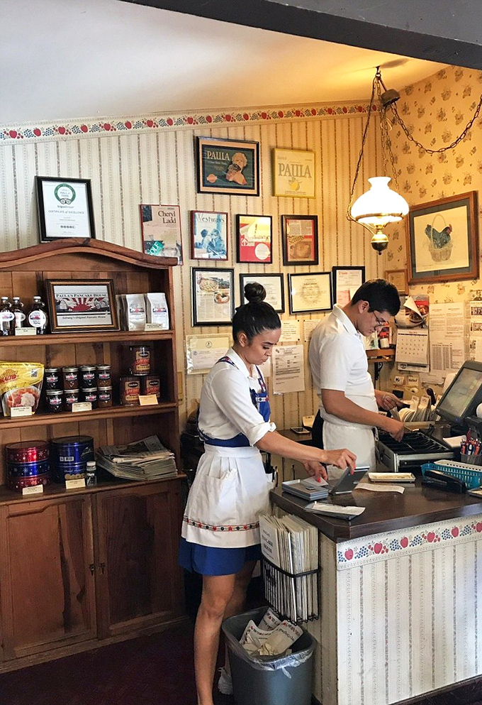 Rustic charm meets breakfast perfection. The wood-paneled walls have witnessed countless first bites of those legendary Danish pancakes.