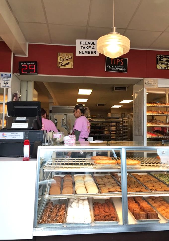 The counter service experience&mdash;where numbered tickets, vintage signs, and display cases full of temptation create the perfect diner atmosphere.