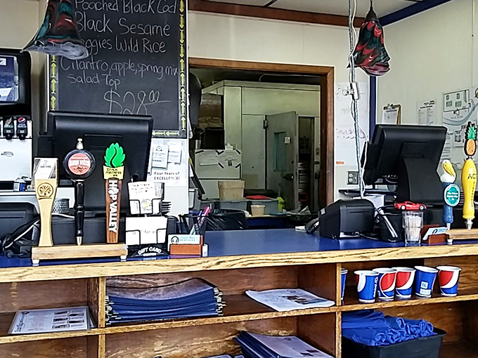 The command center where seafood dreams become reality. That chalkboard special probably has a waiting list by noon.