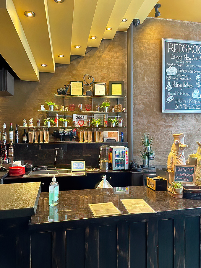 The host station – first stop on your journey to flavor town. Those shelves hold trophies well-earned in the barbecue battlefield.