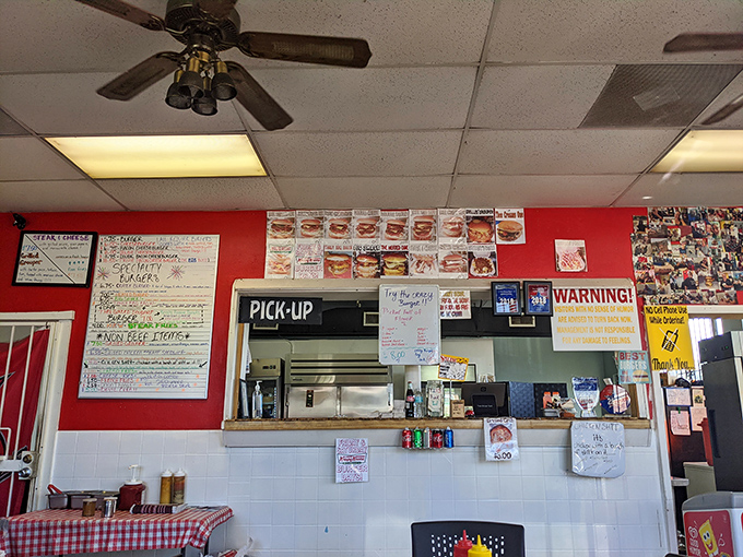 Red walls and checkered tablecloths&mdash;the classic diner aesthetic that whispers, "Trust us, we know what we're doing with these burgers." 