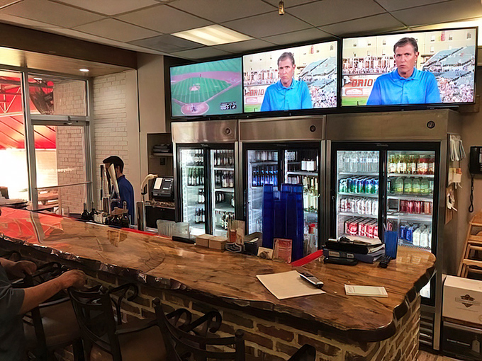 Sports on TV, cold drinks in the cooler, and a live-edge wood bar&mdash;the perfect casual backdrop for serious seafood consumption.
