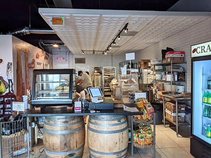 Behind the rustic barrel counter, a world of bread possibilities awaits, proving that sometimes the best restaurants don't need white tablecloths.