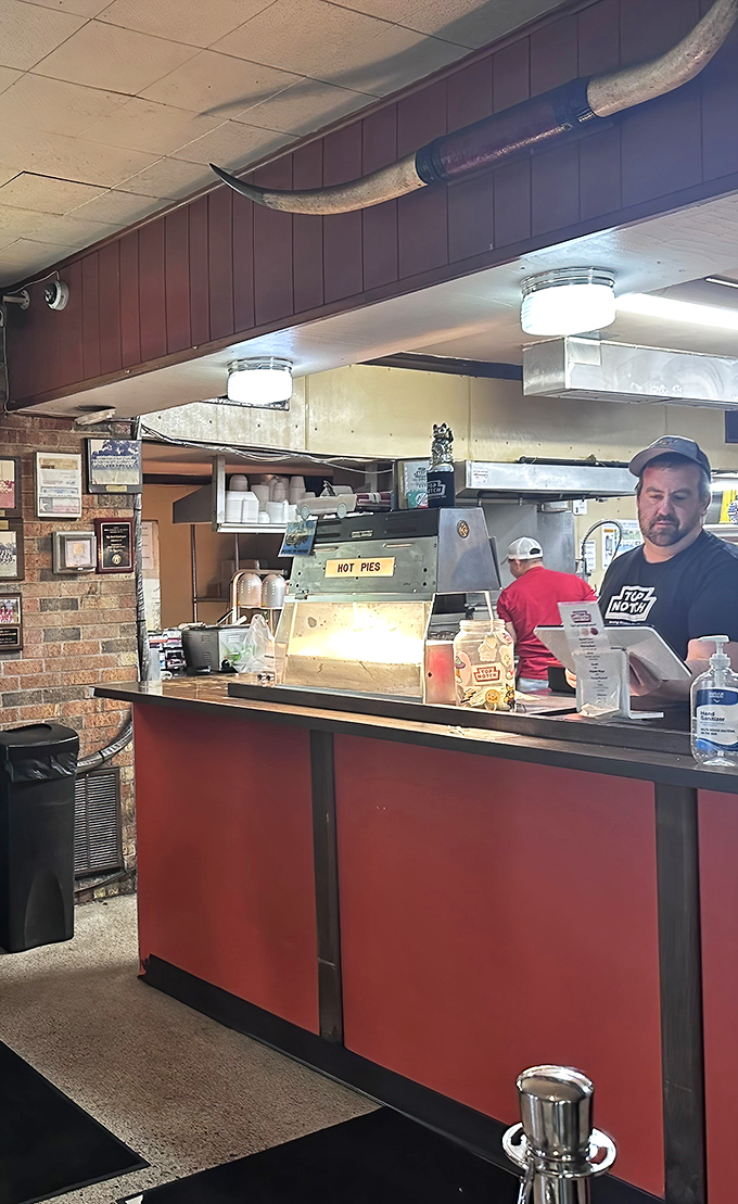Behind this counter, culinary magic happens without fanfare or fuss&mdash;just decades of know-how and the sizzle of a well-seasoned grill. 