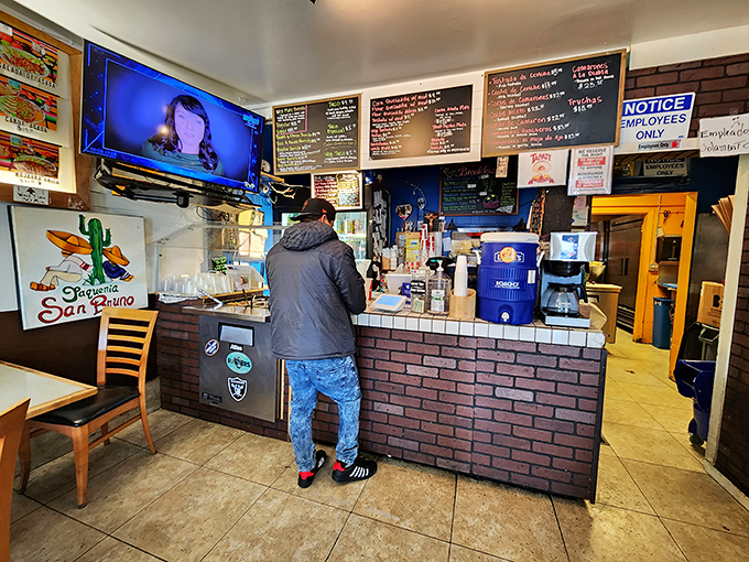 The ordering counter&mdash;that magical threshold where dreams of perfect tacos begin their journey to delicious reality.