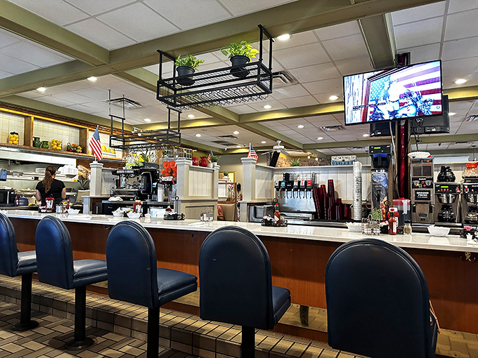 The counter seating&mdash;where solo diners become regulars and the coffee refills come with a side of local wisdom.