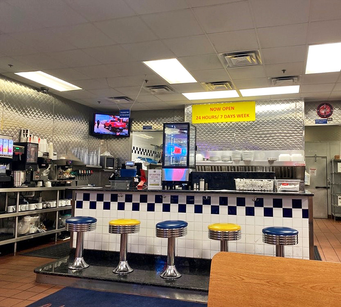 The counter seats&mdash;front row tickets to the greatest show on earth: short-order cooks performing culinary choreography with practiced precision.