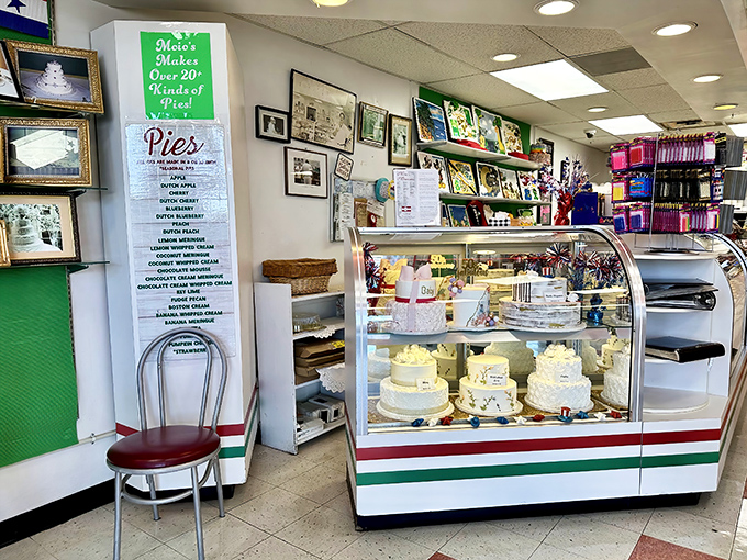 The wedding cake display reminds us that life's biggest moments deserve something better than grocery store sheet cake. These tiers of joy have witnessed generations of "I do's."
