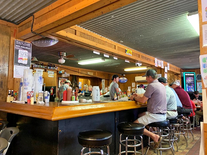 The bar at Hunt's is where the magic happens. Those stools have supported generations of seafood enthusiasts waiting for their next dozen oysters.