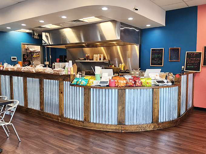 The counter where sandwich magic happens. Part rustic charm, part industrial cool, all delicious anticipation as orders come together.