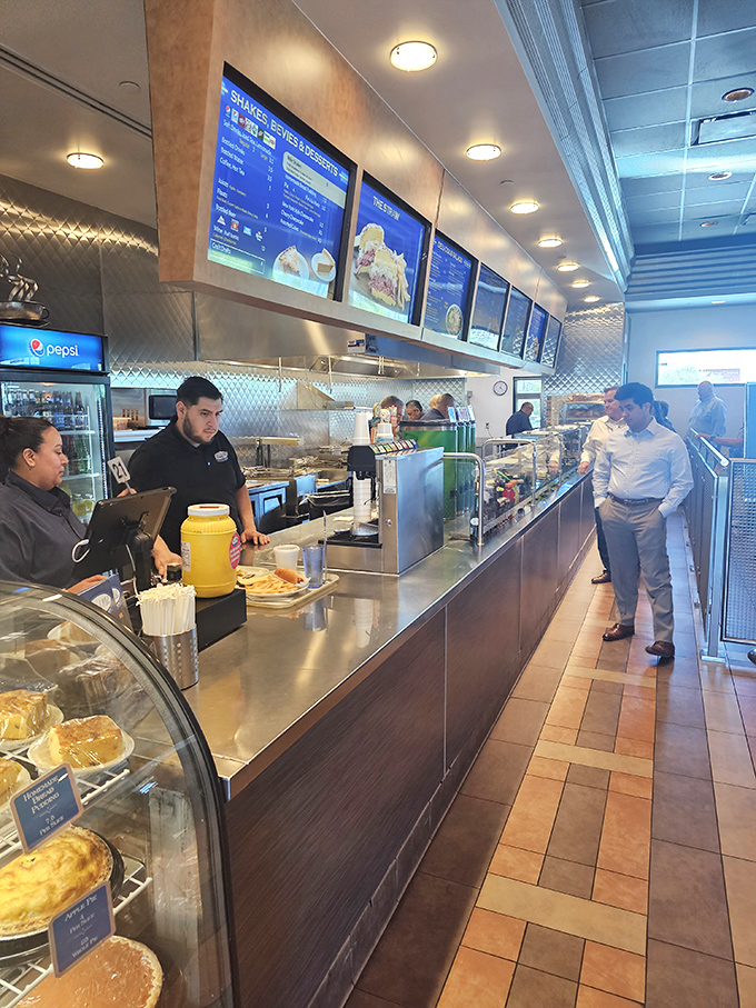 The counter where magic happens &ndash; a deli version of watching artists at work. Each sandwich assembled with the precision of a Swiss watchmaker.