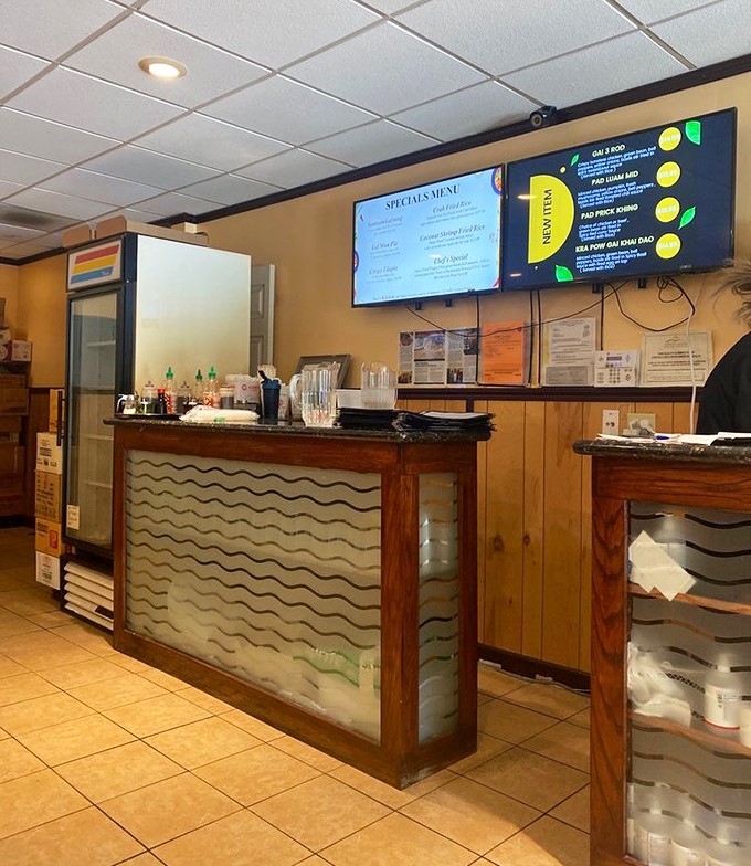 The counter area combines efficiency with warmth &ndash; where digital menus meet the personal touch that makes neighborhood restaurants special.