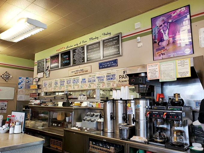 The counter view reveals the command center of comfort food operations, where breakfast dreams become delicious reality.
