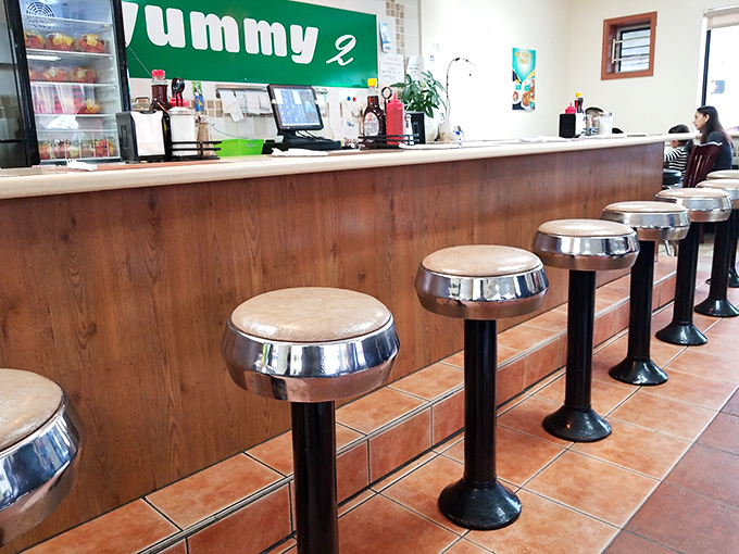 Classic diner counter stools&mdash;where solo diners become temporary members of the breakfast club and coffee refills appear like magic.