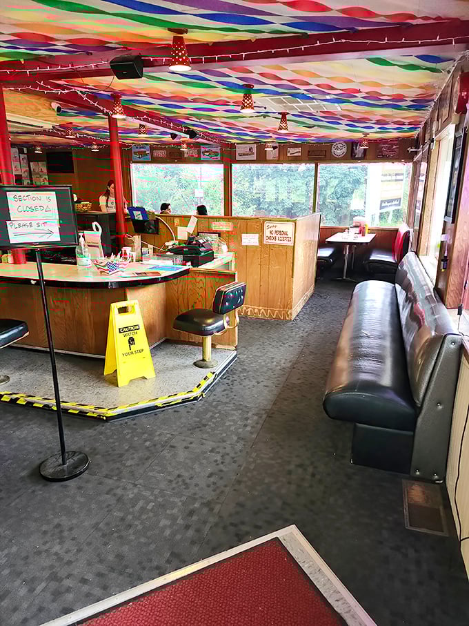 The heart of operations&mdash;where orders are called, shakes are blended, and the magic happens behind that well-worn wooden counter.
