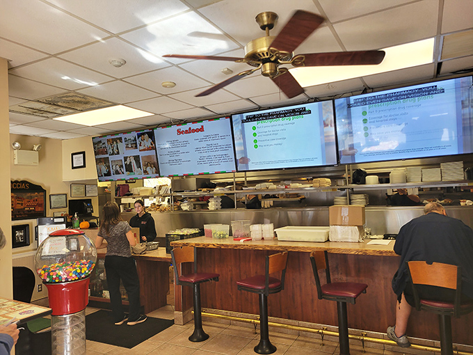 The counter service area buzzes with efficiency, where sandwich artisans craft their masterpieces with practiced precision.