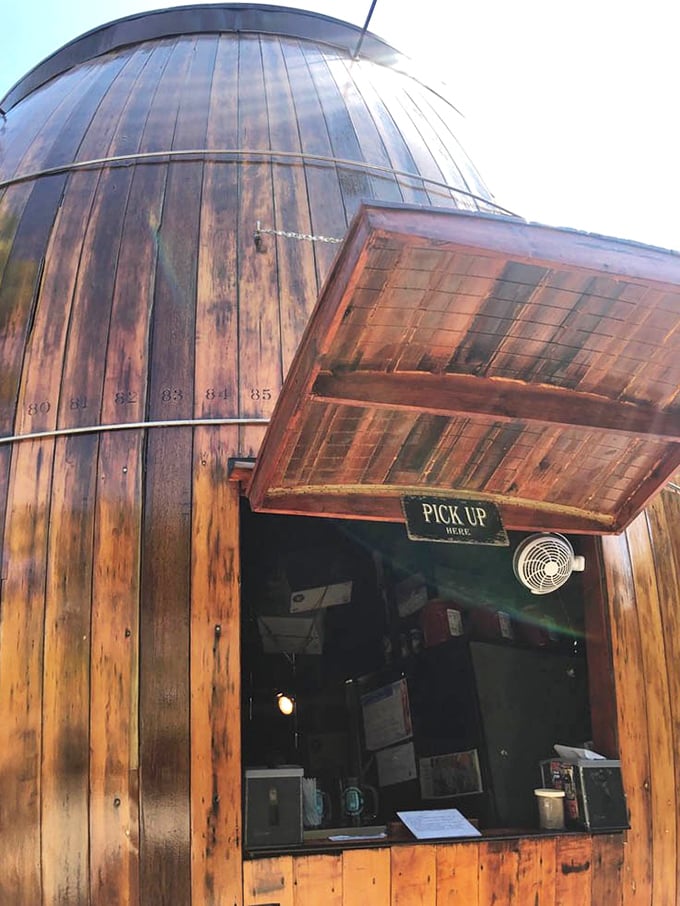 The pickup window&mdash;where anticipation peaks just before the reward. Like Christmas morning, but with hot dogs and root beer.