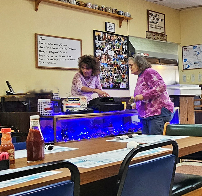 The counter where coffee cups never stay empty and conversations never run dry.