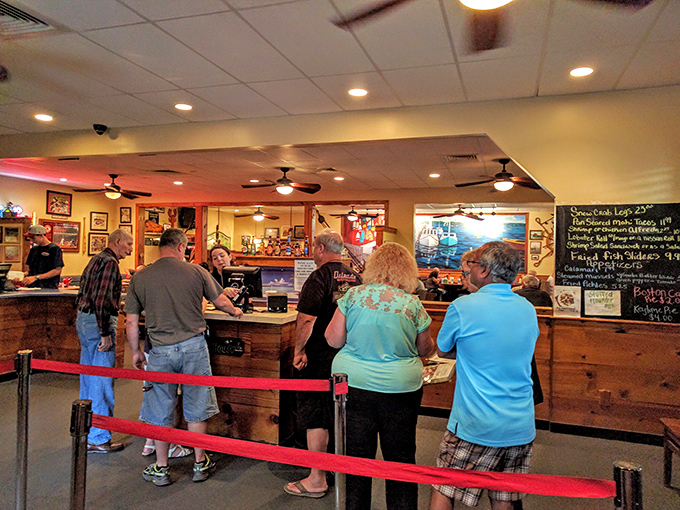 The moment of truth: placing your order at the counter. The anticipation builds as you commit to your seafood destiny.