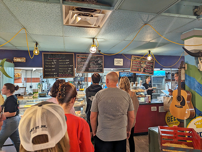 The counter where breakfast dreams come true. That pastry case isn't just displaying food&mdash;it's exhibiting edible art with a side of Florida charm.