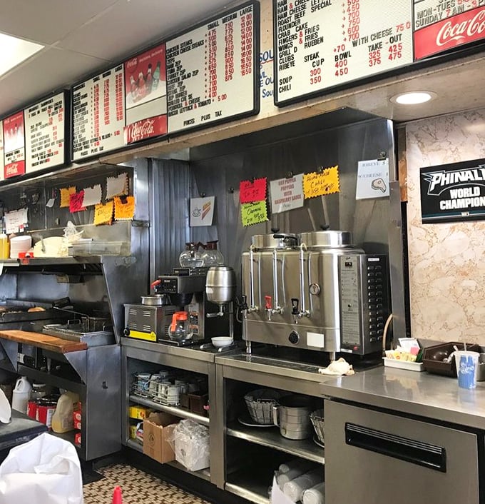 Where decisions are made and appetites are satisfied. The menu board's simplicity belies the complexity of flavors waiting below.