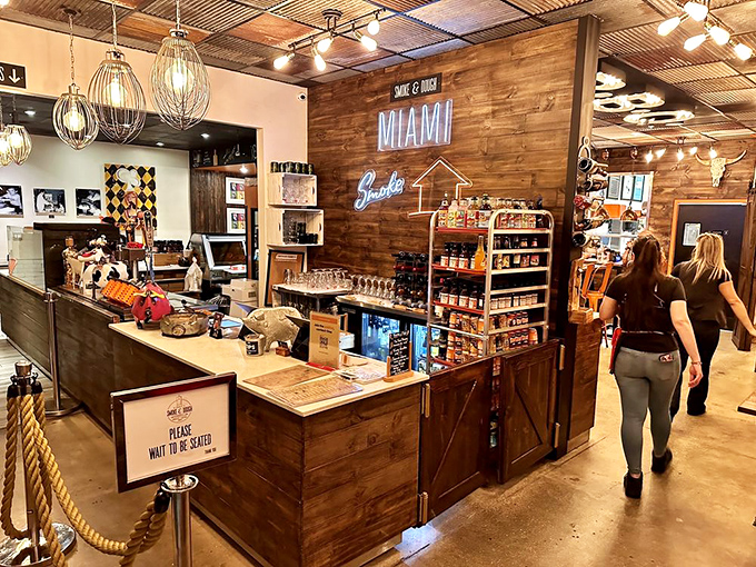 The counter where barbecue dreams come true. That "Miami Smoke" neon sign is basically the North Star for meat lovers.