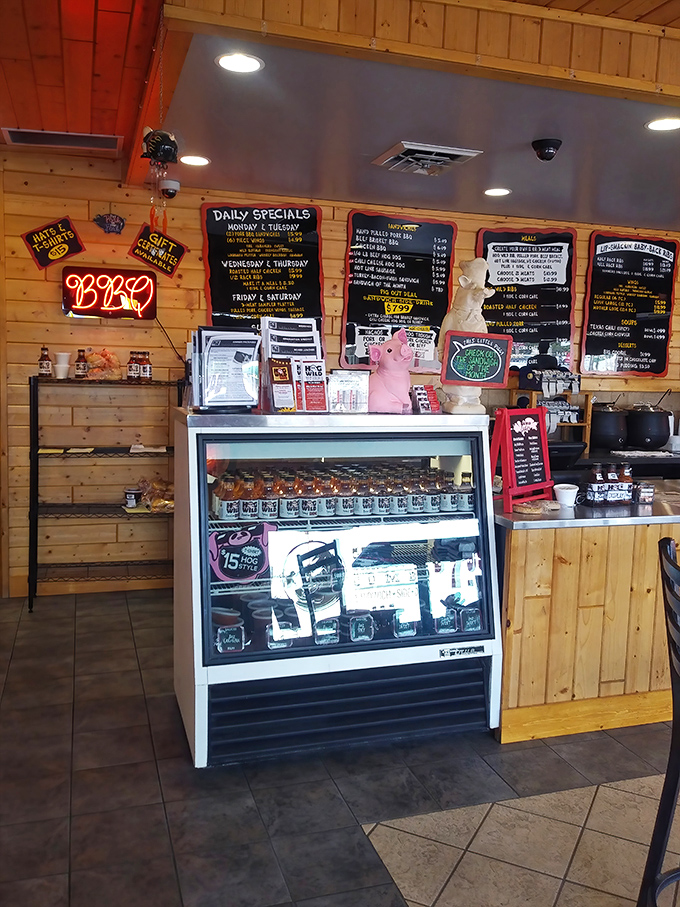 Daily specials scrawled on blackboards promise rotating treasures for regulars. That neon pig sign isn't just decoration&mdash;it's a beacon of hope for the hungry.