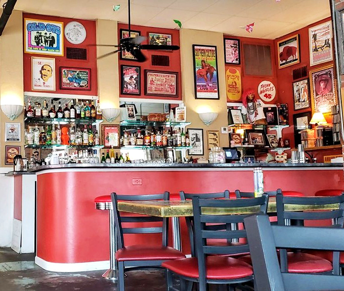 The bar area showcases Texas pride with every square inch covered in memorabilia. Even the barstools look ready to tell stories.