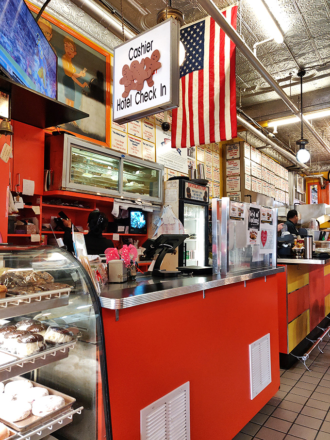 The beating heart of the operation: a counter where orders fly, coffee flows, and pastry dreams come true.